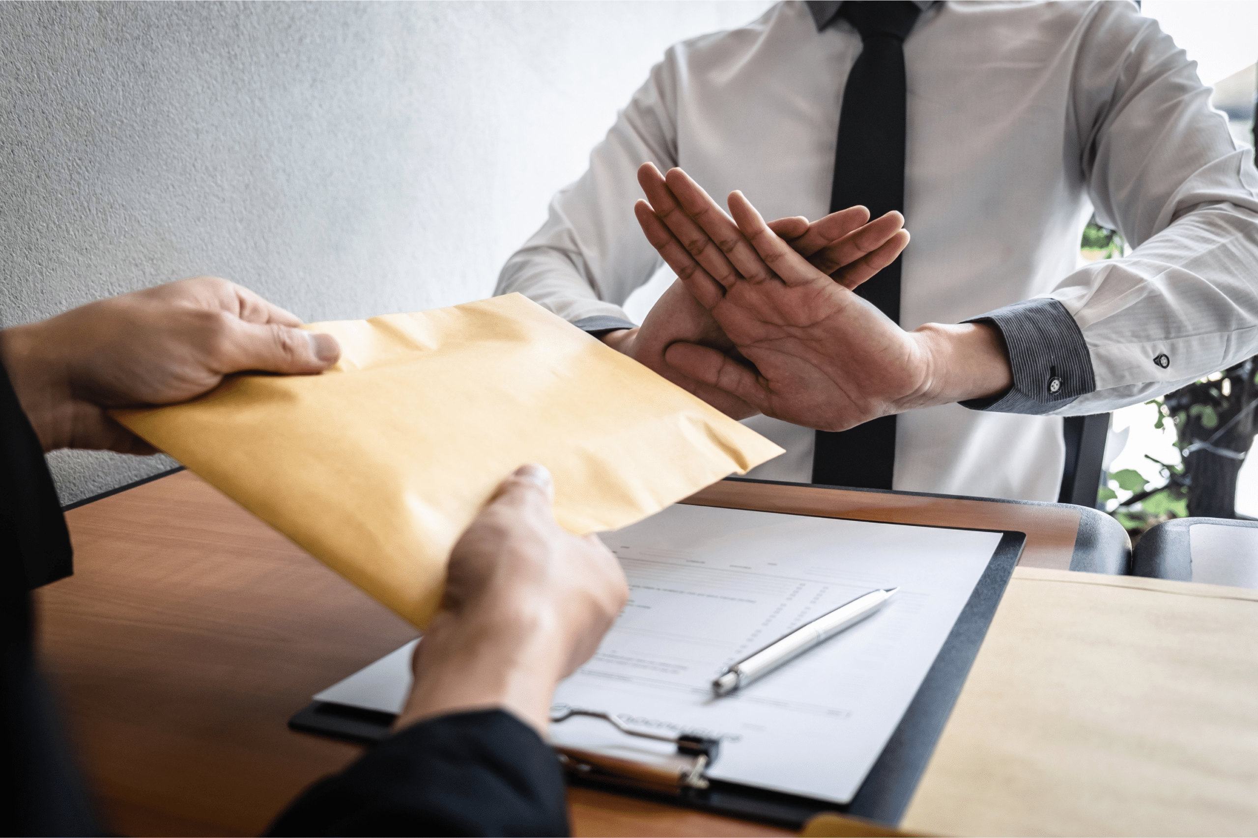 Learn The Intricacies of Bribery Charges In Denver | Bribery